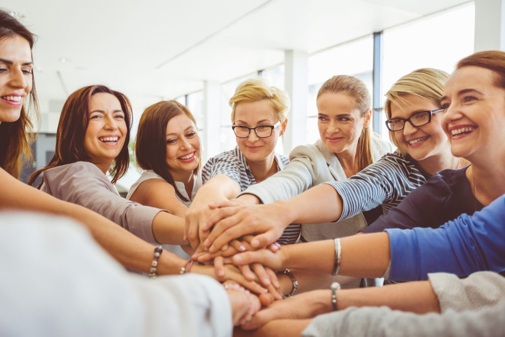 Cooperation and teamwork business concept | Welcome to Birth Coach Method